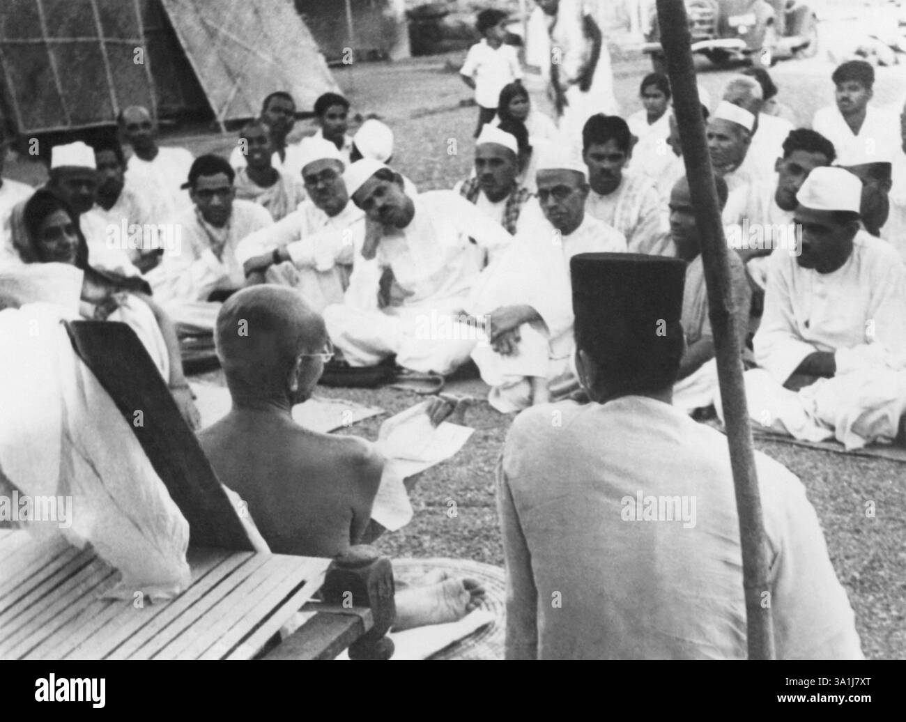 Mahatma Gandhi speaking to visitors at Sevagram Ashram, 1942 NA MR ...