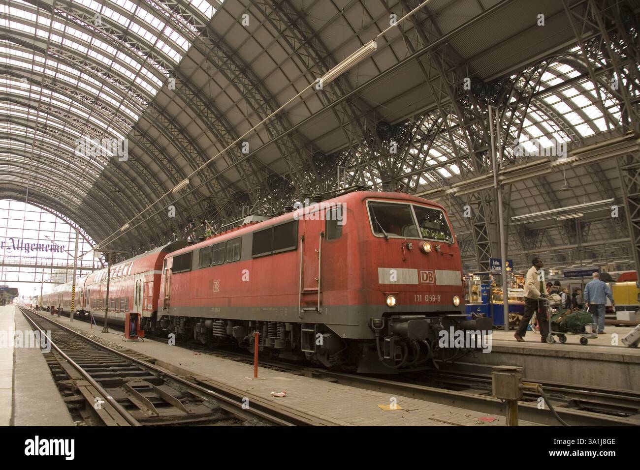 Red color train, German railway urban living space building modern ...