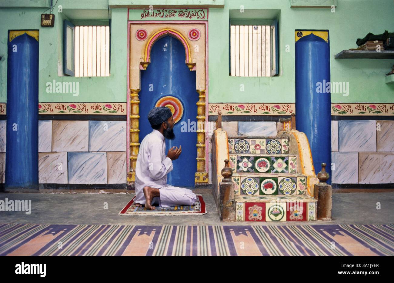 A muslim offering namaz, worshiping in a mosque Dhangadhra, Gujarat ...