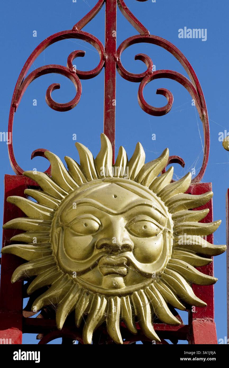 Sun statue on door of City palace museum, Udaipur, Rajasthan, India ...