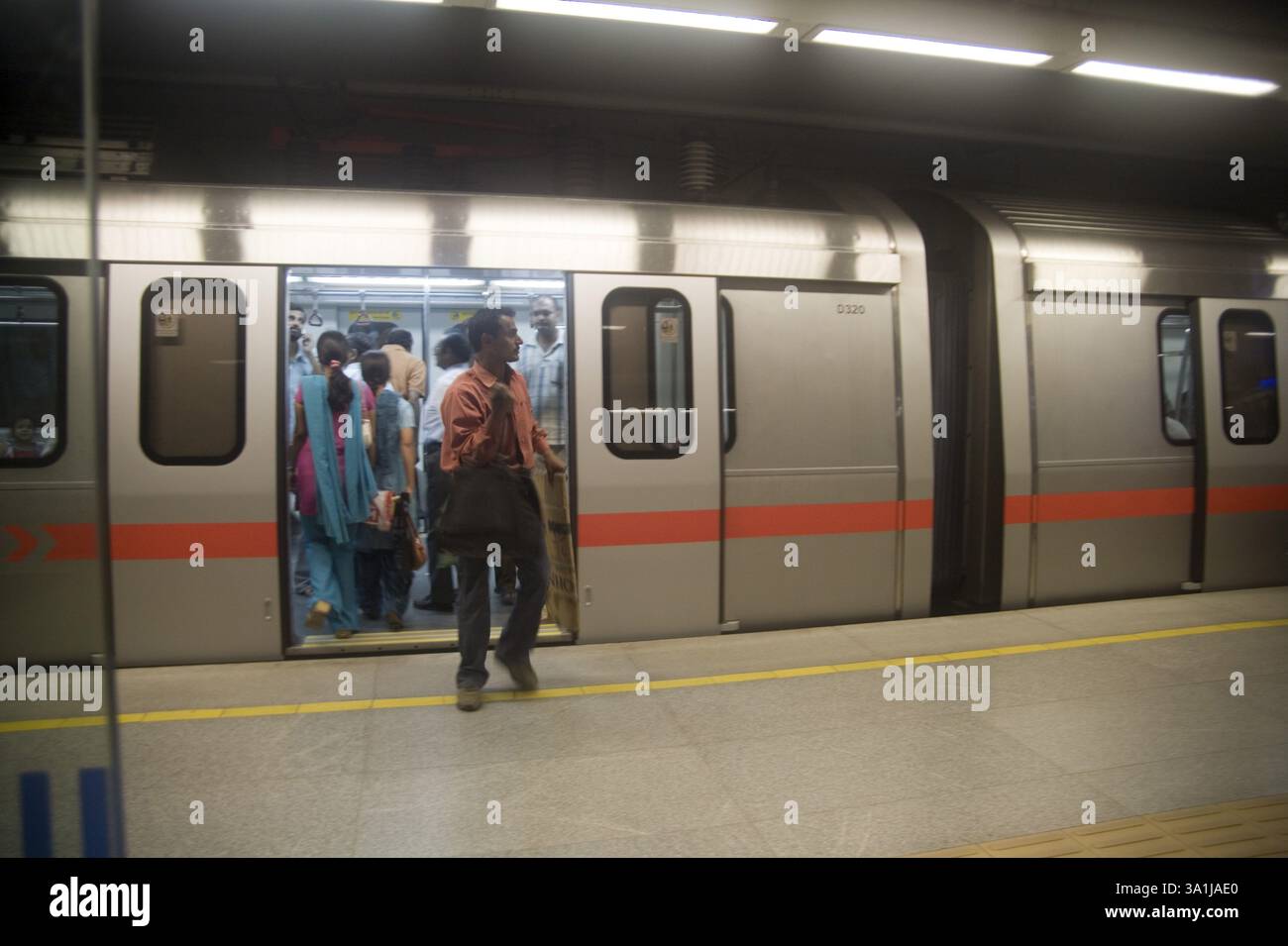 Delhi underground metro railway train passengers board inside, New ...