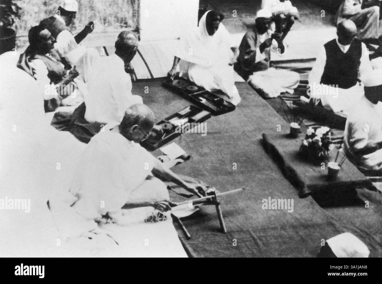 Mahatma Gandhi, Mahadev Desai and others spinning, Bardoli, 1939, India ...