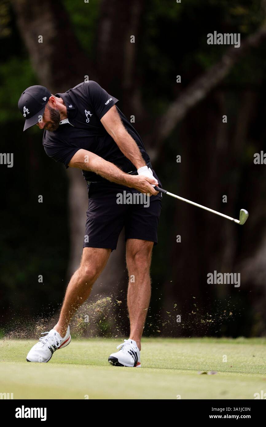Captain Dustin Johnson of 4Aces GC hits his shot on the third hole ...