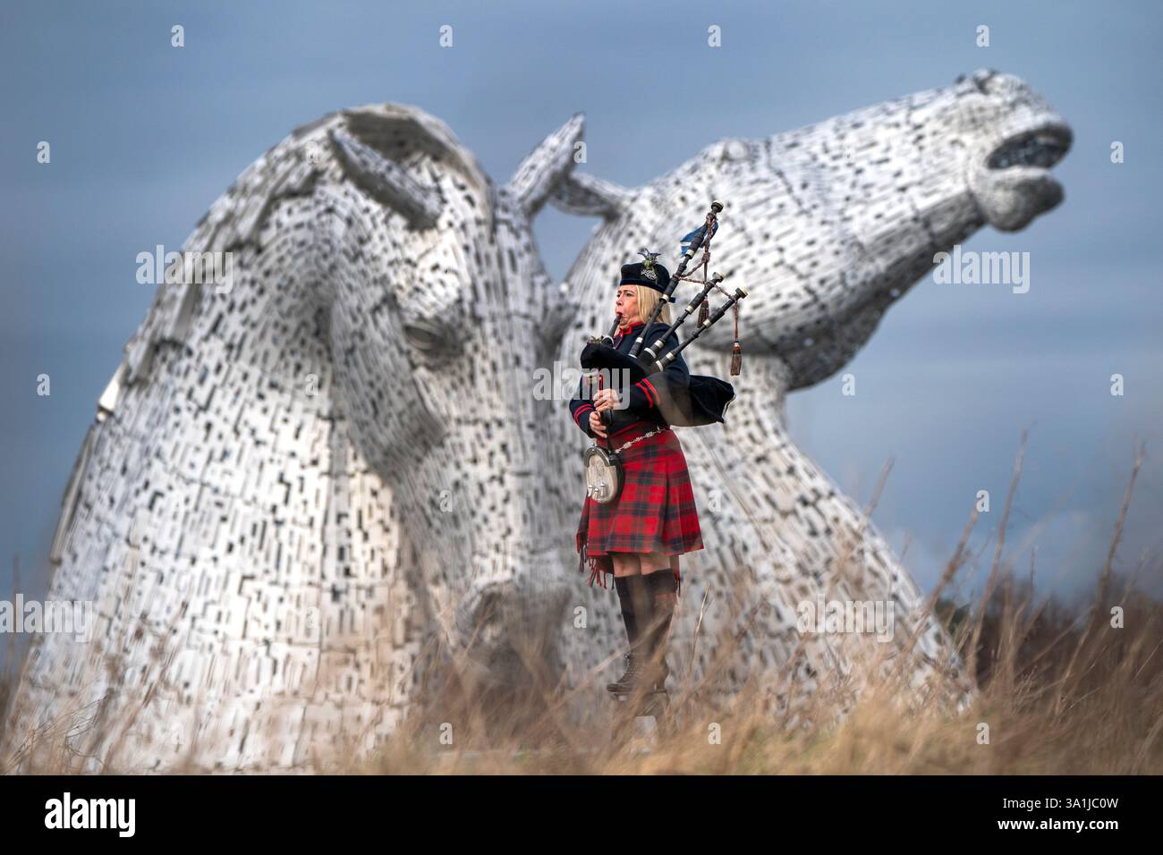 Scotland's National Piper Louise Marshall plays at The Kelpies in ...