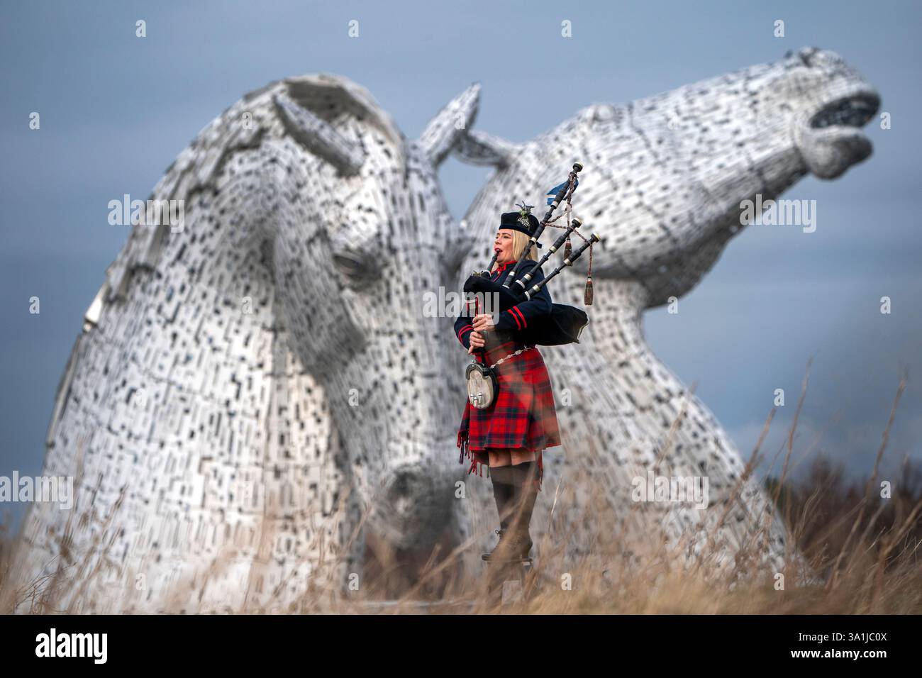 Scotland's National Piper Louise Marshall plays at The Kelpies in ...