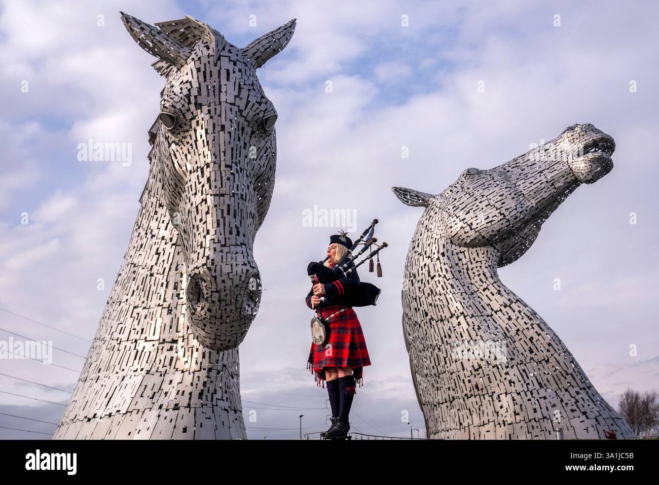 Scotland's National Piper Louise Marshall plays at The Kelpies in ...