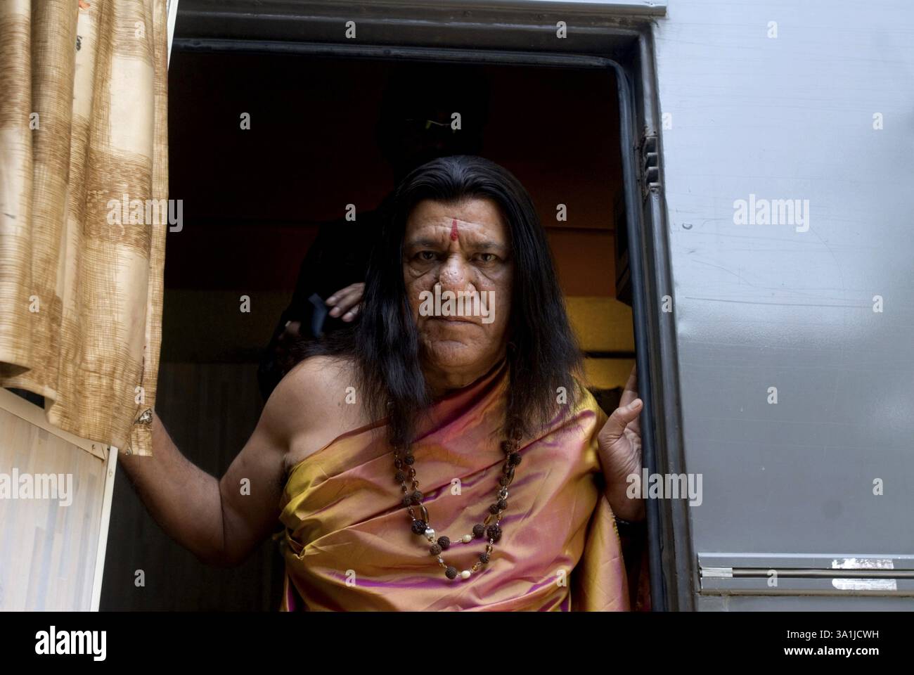 South Asian Indian Bollywood actor Om Puri in a priest's get up for a ...