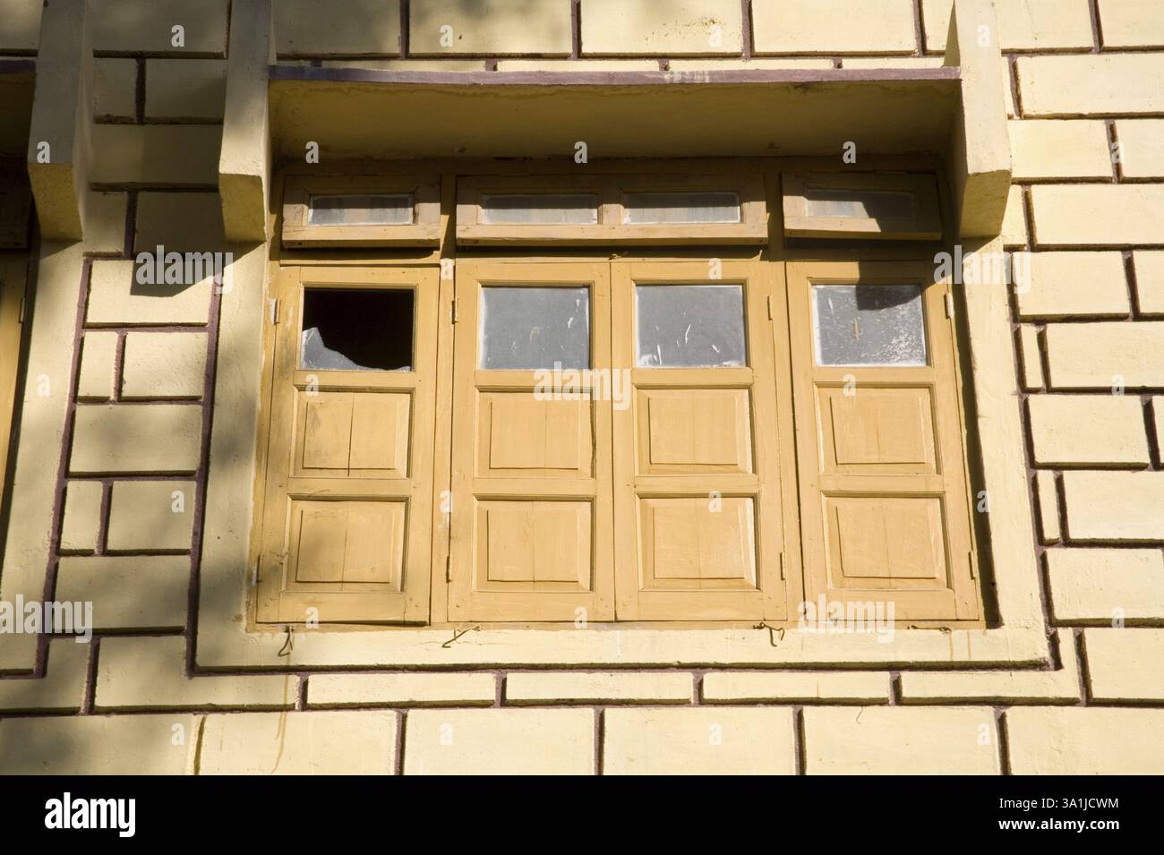 Closed windows with one broken glass, village Dilwara, Udaipur ...