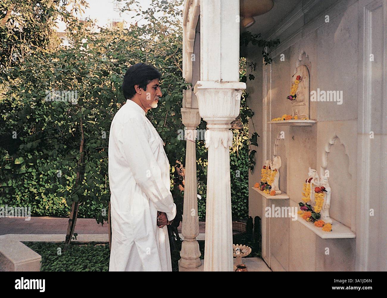 South Asian Indian Bollywood actor Amitabh Bachchan in front of temple ...