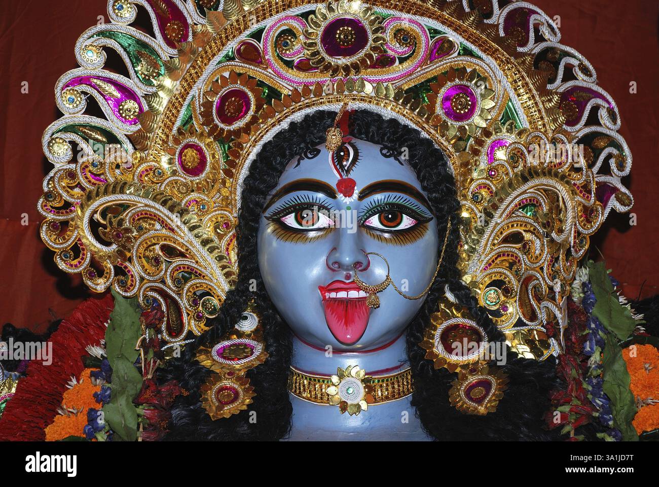 Decorative Kali clay model showing third eye open on Durga puja Stock ...