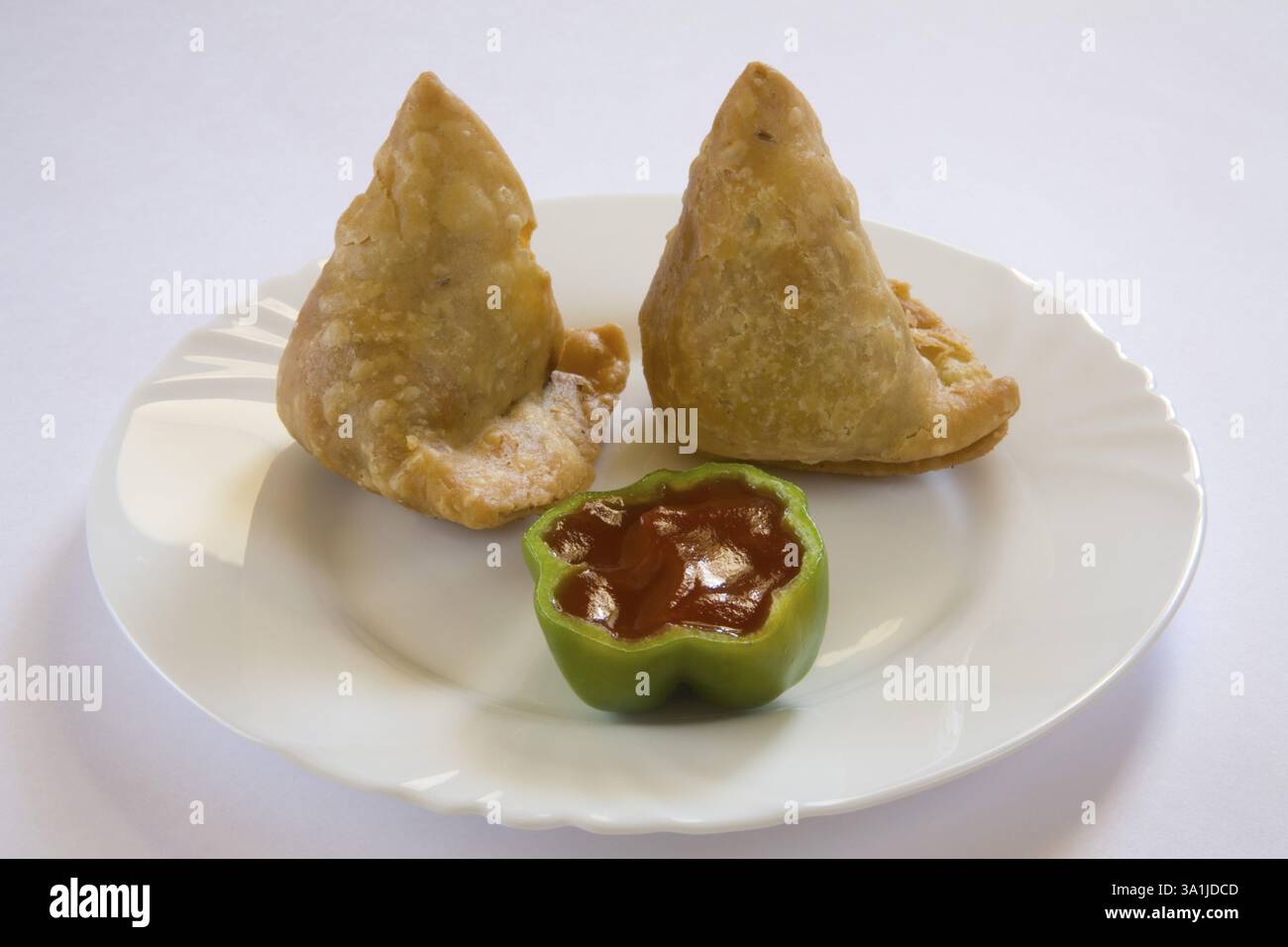 Indian fast food fried samosa potato filling maida wheat flour cover ...