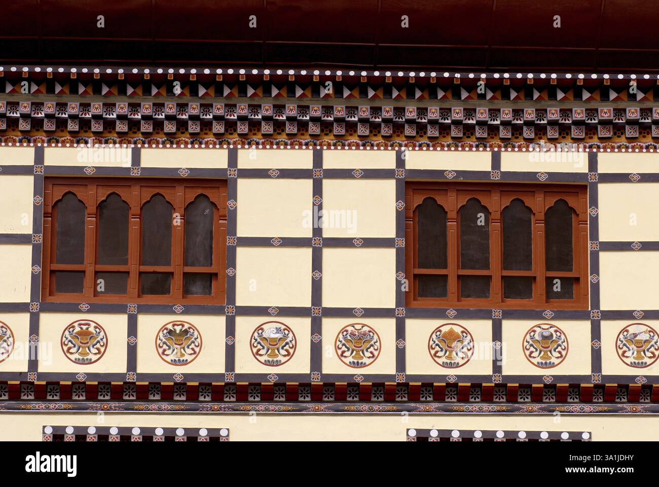 Decorative building wall with lucky sign at Paro Royal Govt of Bhutan ...