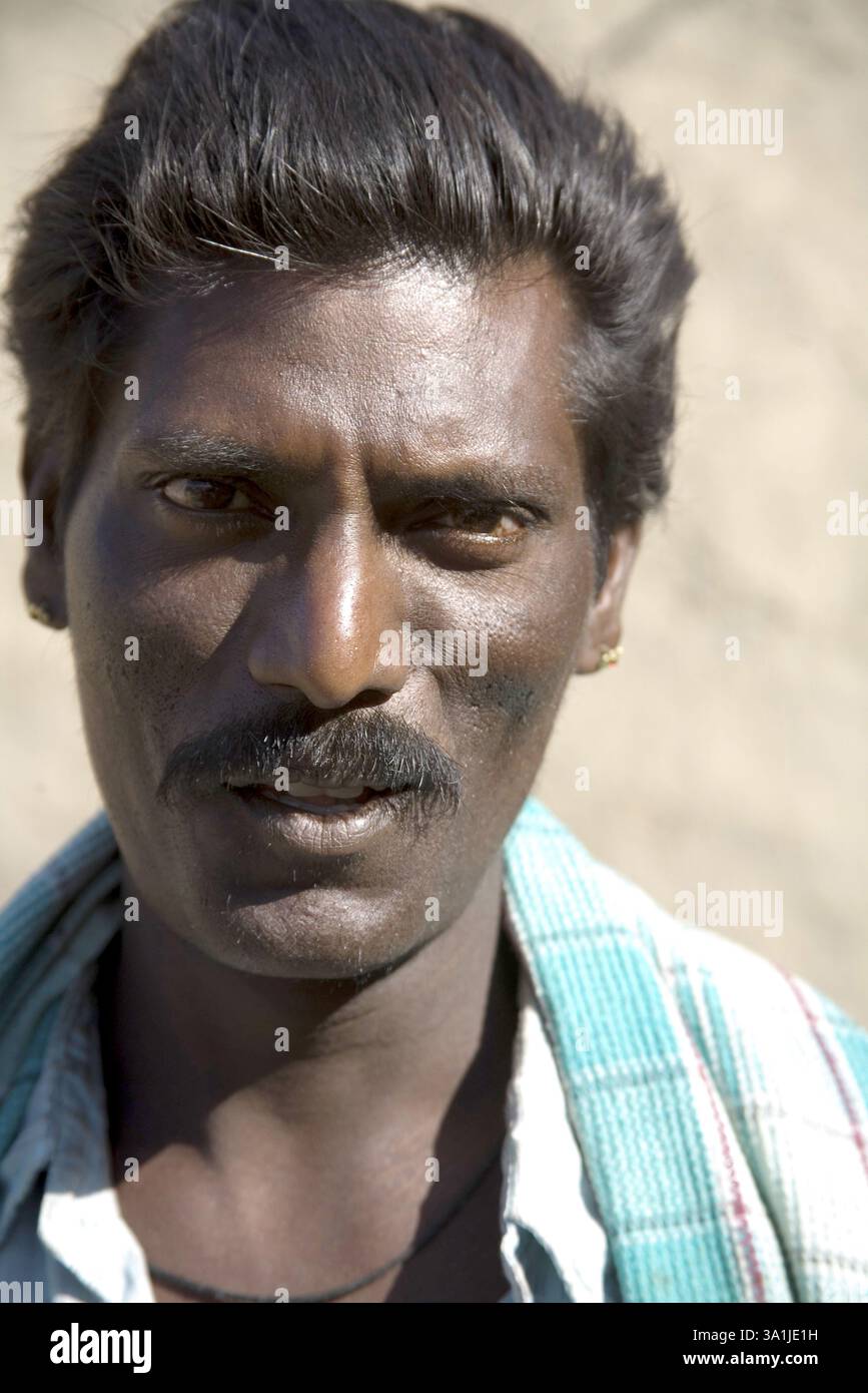 Black tribal man, Bheel basti, village Dilwara, Udaipur, Rajasthan ...