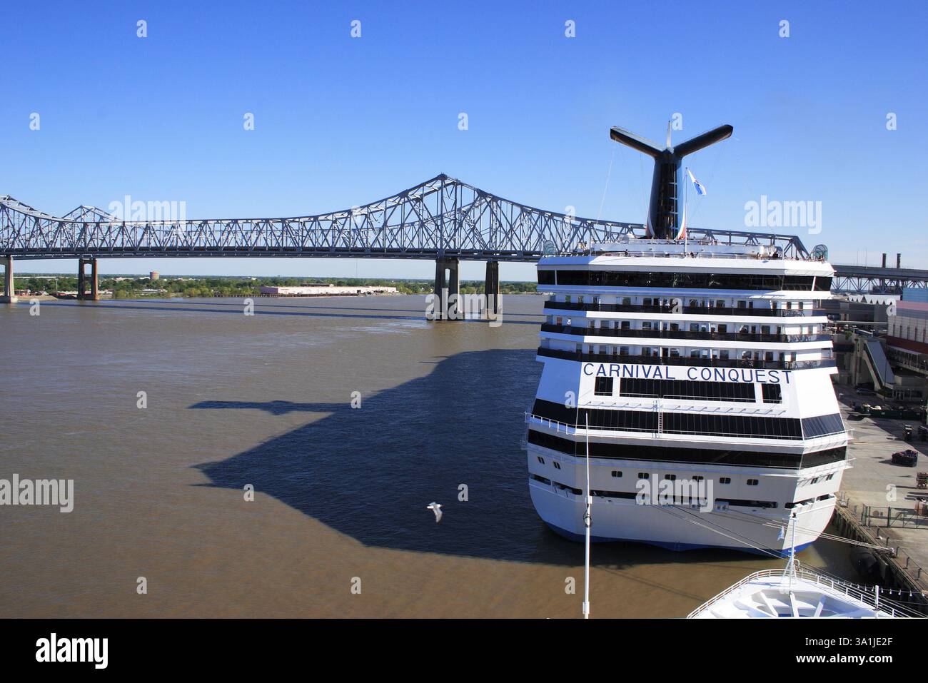 Cruise ship near the crescent city connection bridge over the ...