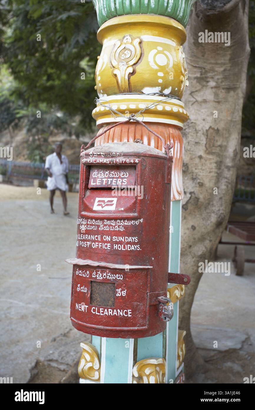 Red Letter box of Indian Post hung on a decorative pillar at Sri ...
