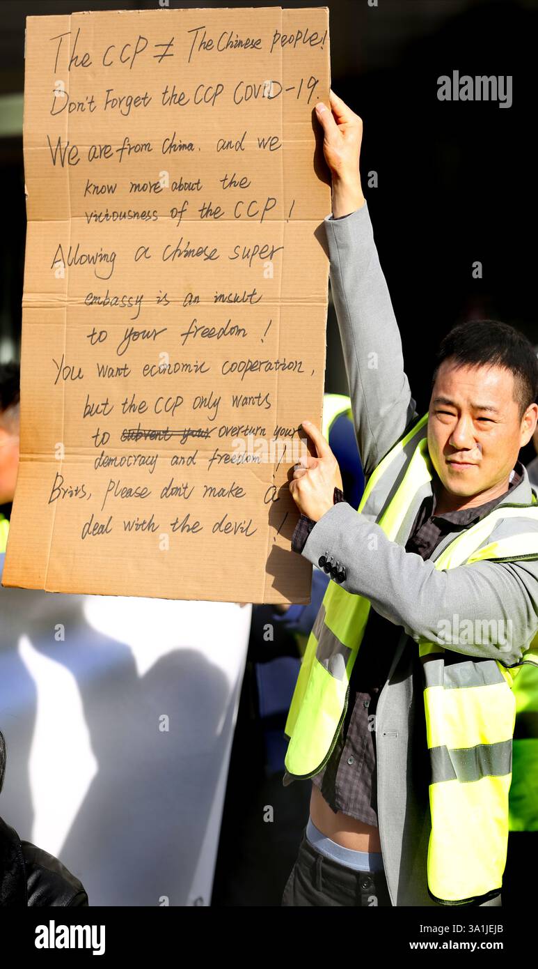 London, England, UK. 8th Mar, 2025. A protester holds up a sign warning ...