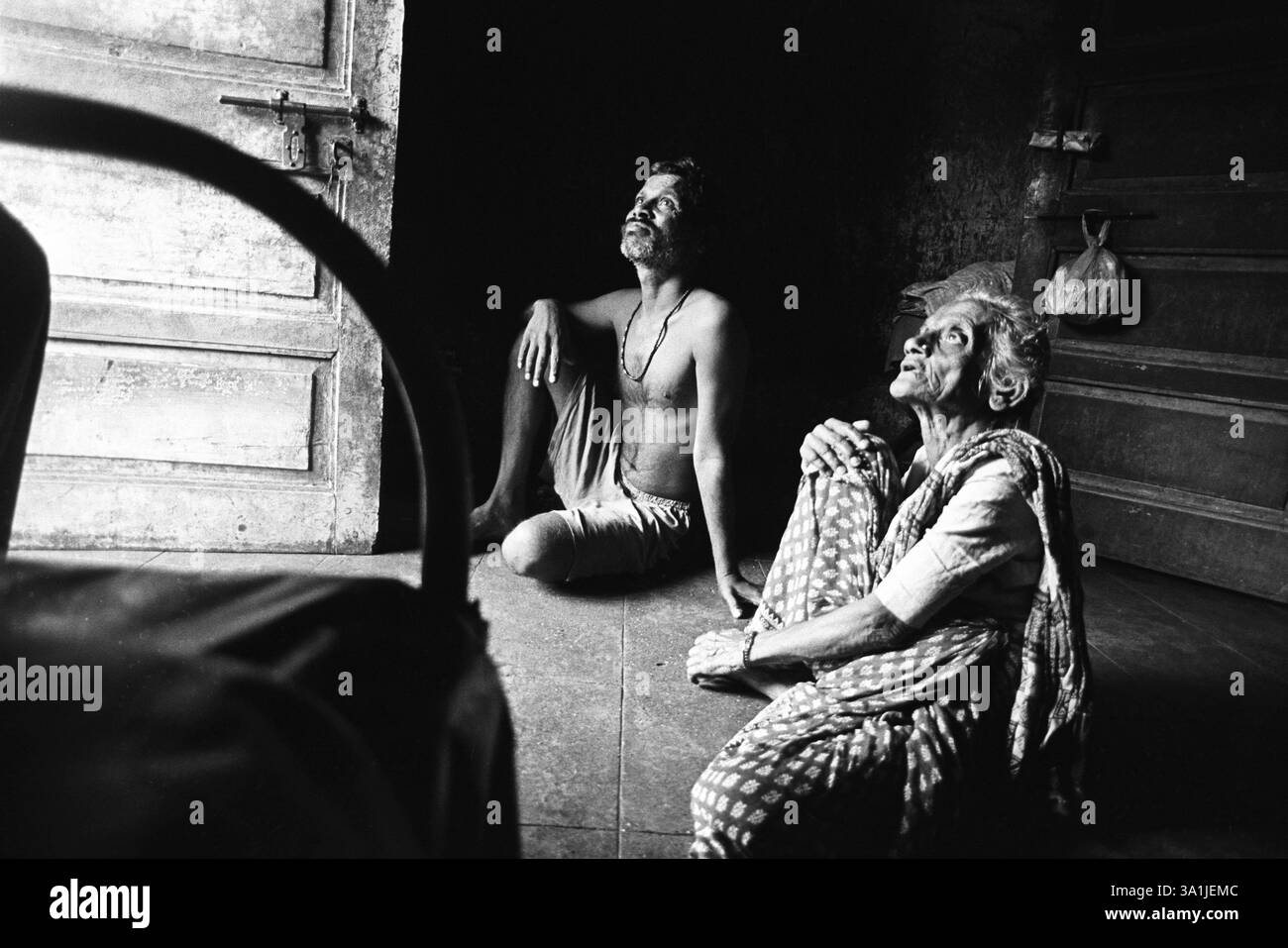 2 sitting men Black and White Stock Photos & Images - Alamy