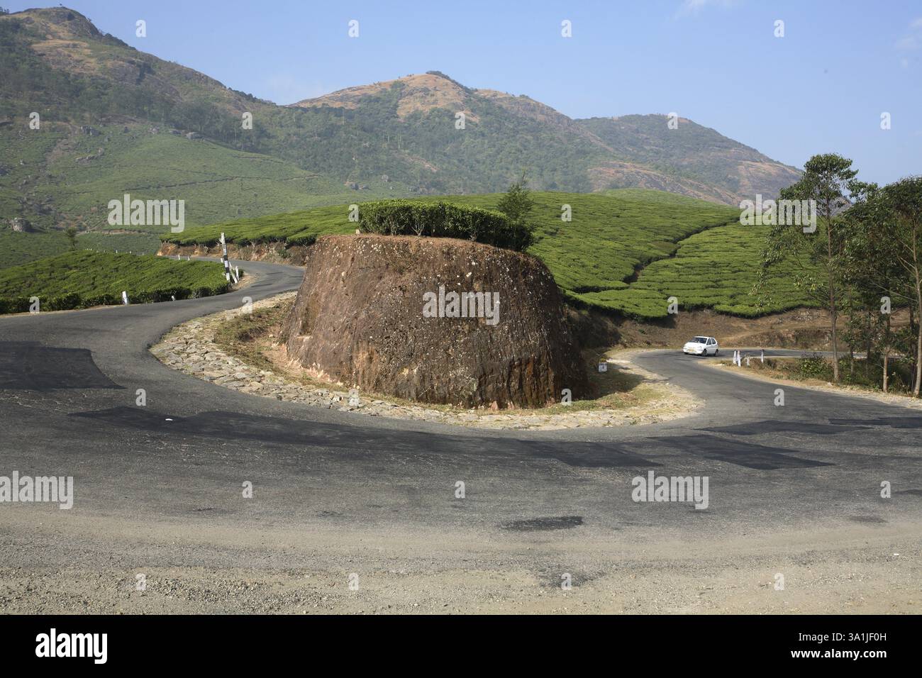 Hair pin bend circular bend of road from Munnar to Periyar with Tea ...