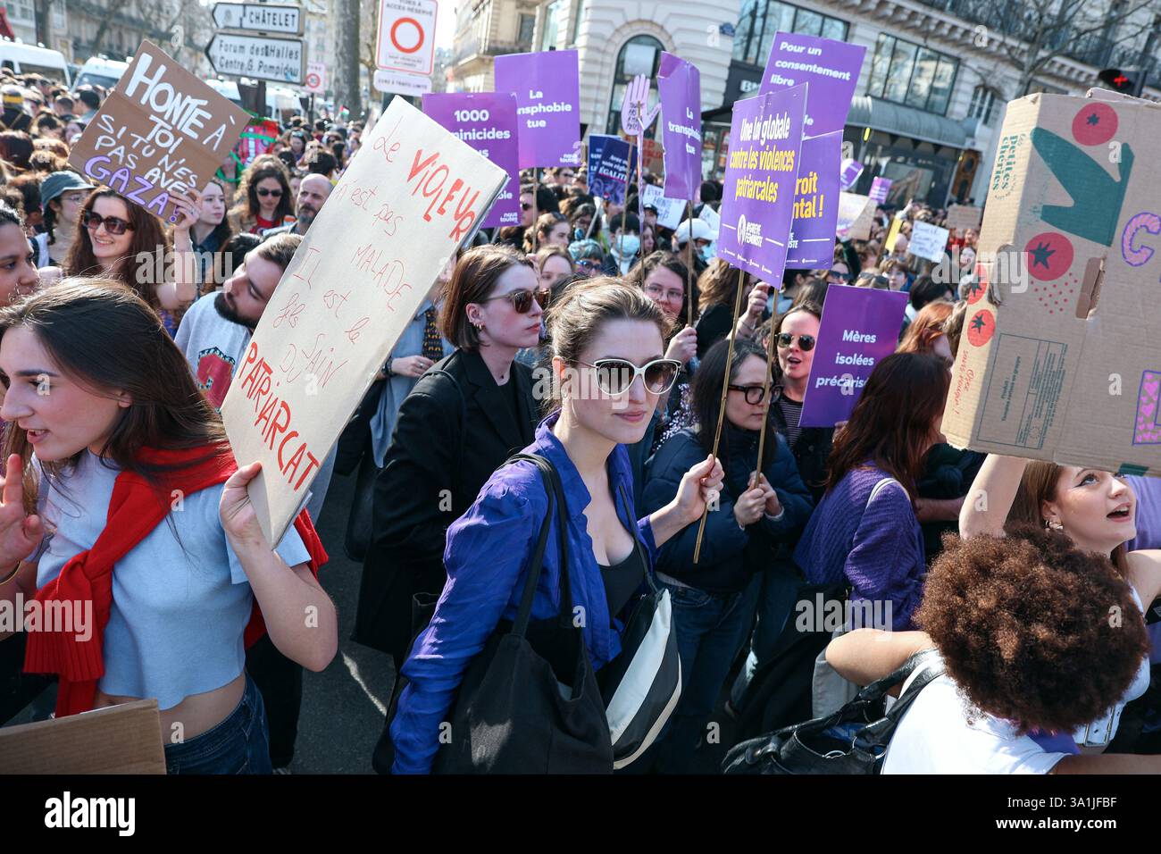 Paris, France. 08th Mar, 2025. A group of protesters with placards for ...