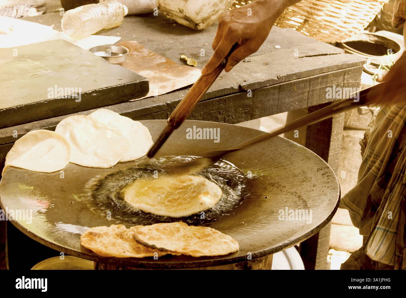 Paratha on pan hi-res stock photography and images - Alamy