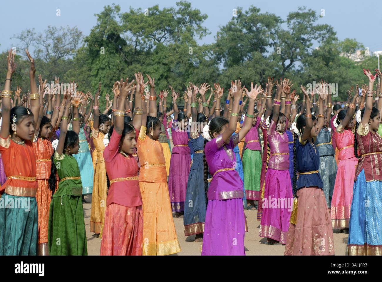 Children performing group dances in festive program, Kerala, India ...