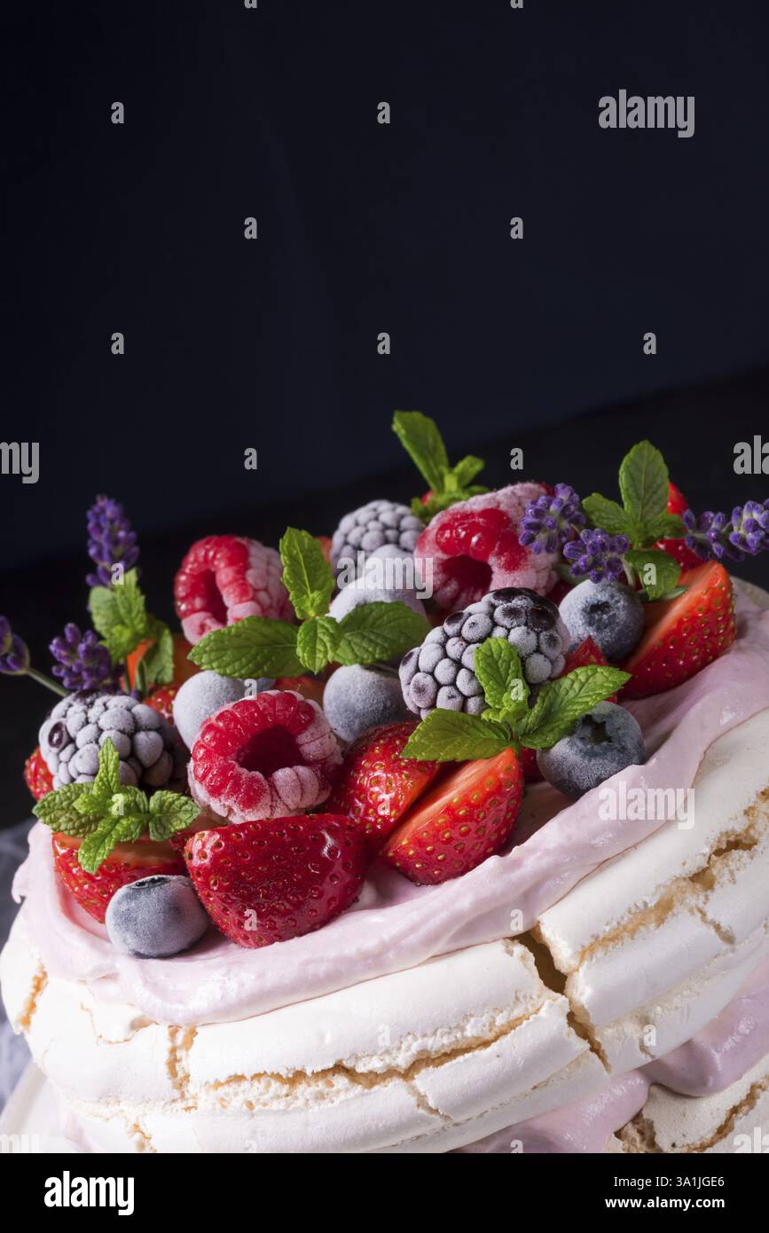 Pavlova with berry fruits Stock Photo - Alamy