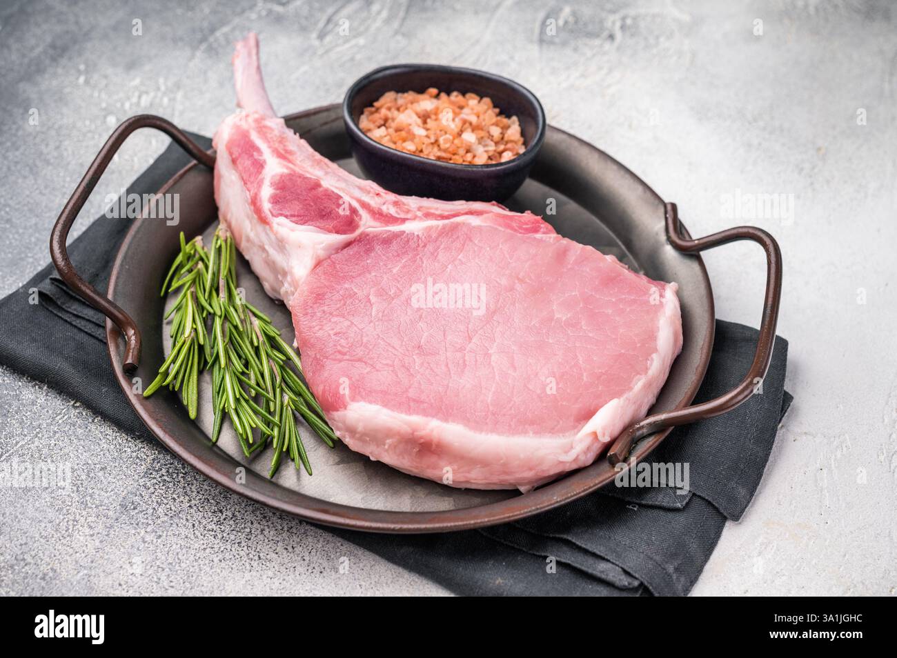 Raw pork rib chop steak, highlighting the rich texture and flavor that ...