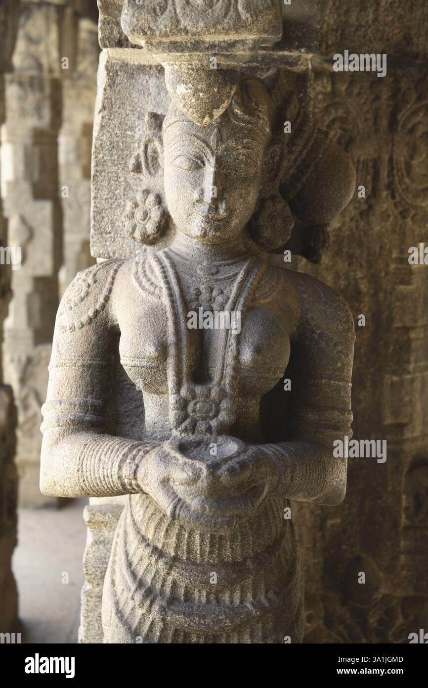 Carved figurines carrying lamps, Carving on the pillars, Near Nataksala ...