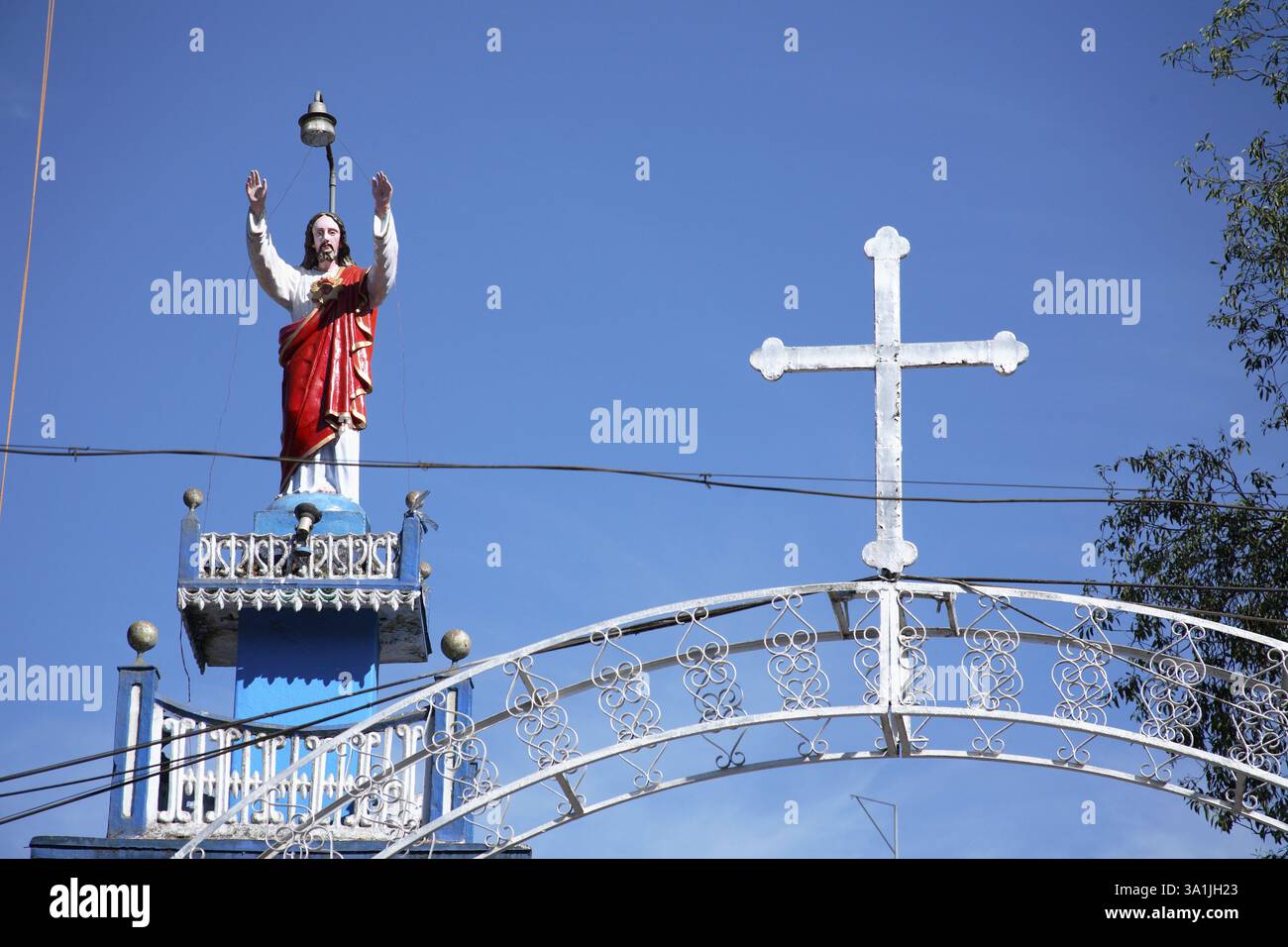 Statue of Jesus Christ raising his both hand for giving blessings with ...