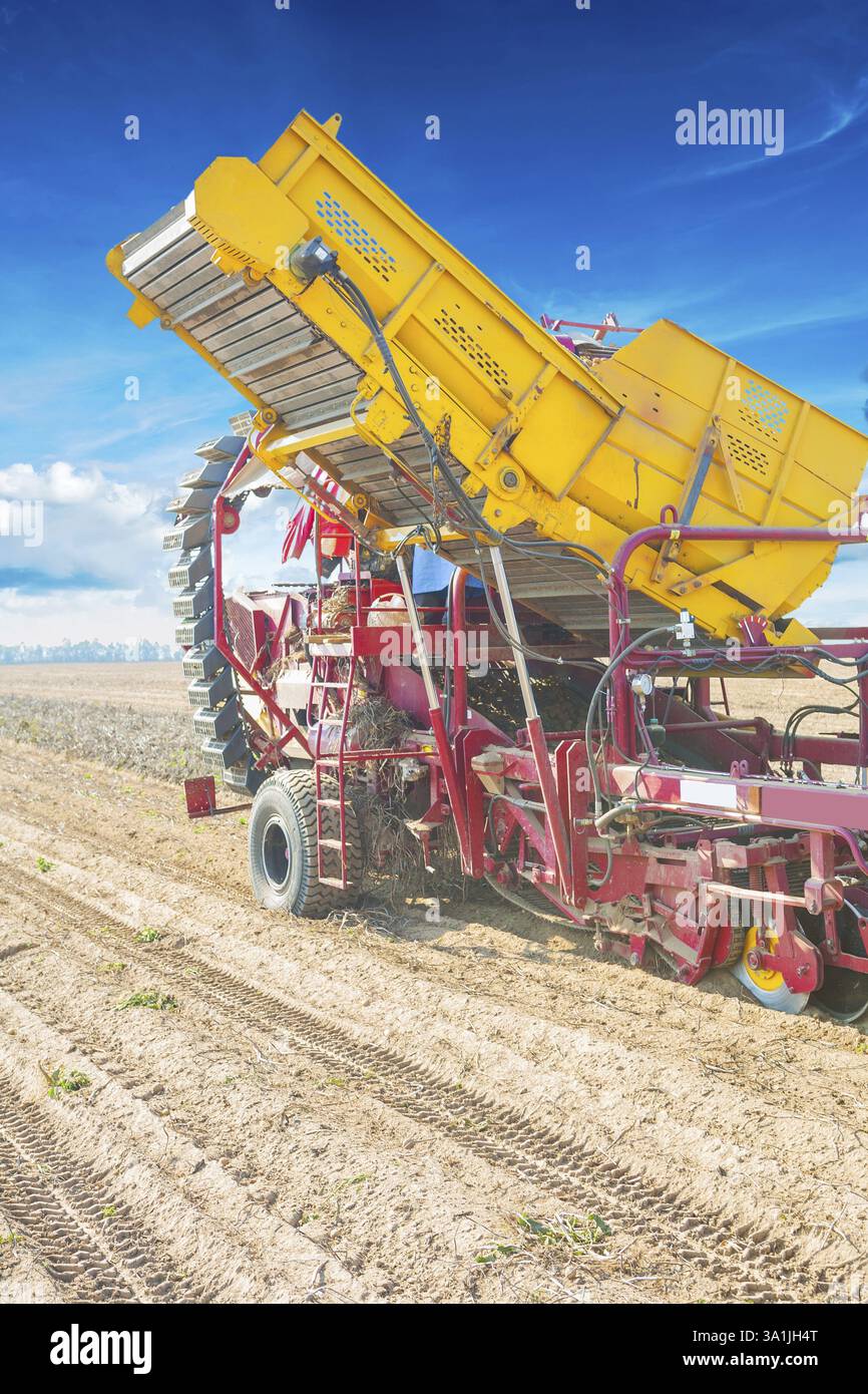 Potato harvester in work close up view agricultural concept Stock Photo ...