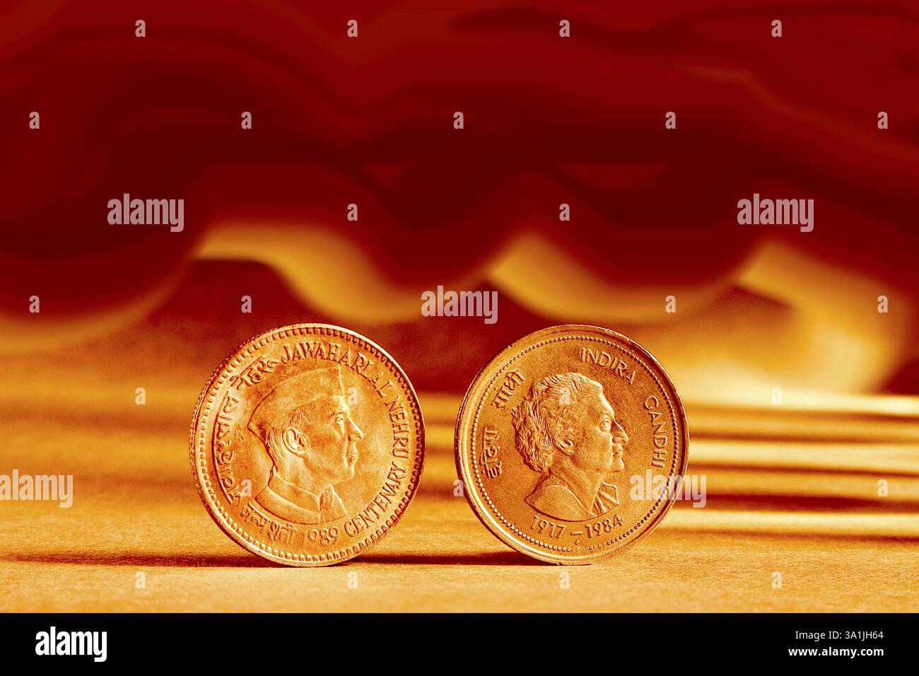 Double pair Indian currency five rupees coin and artistic background ...