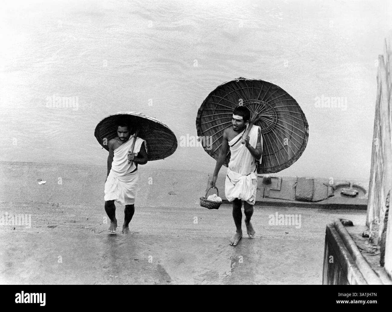 Priests climbing steps, India, Asia Stock Photo - Alamy