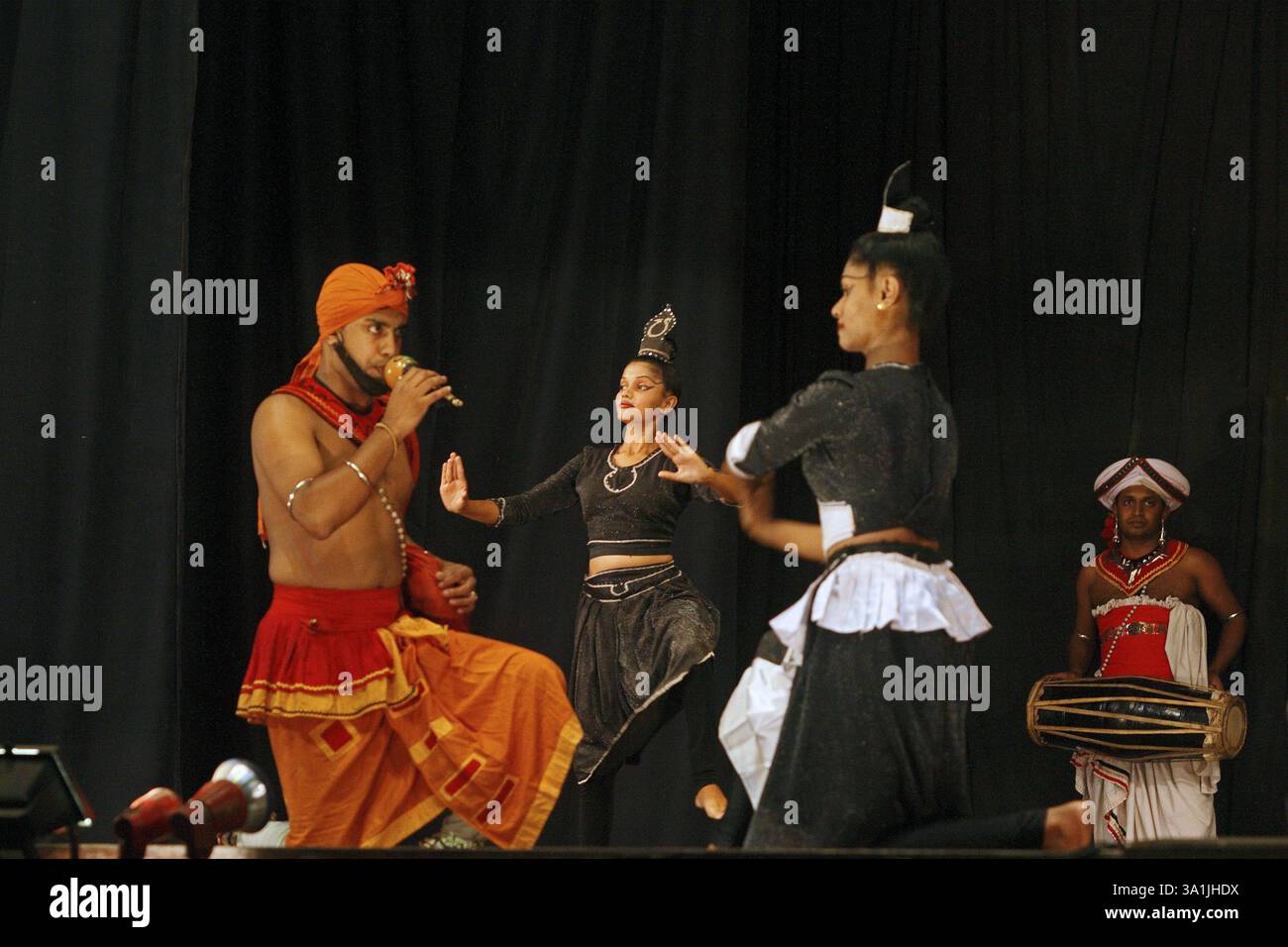Cobra dance, depicts the movements of the cobra and the taming of it by ...