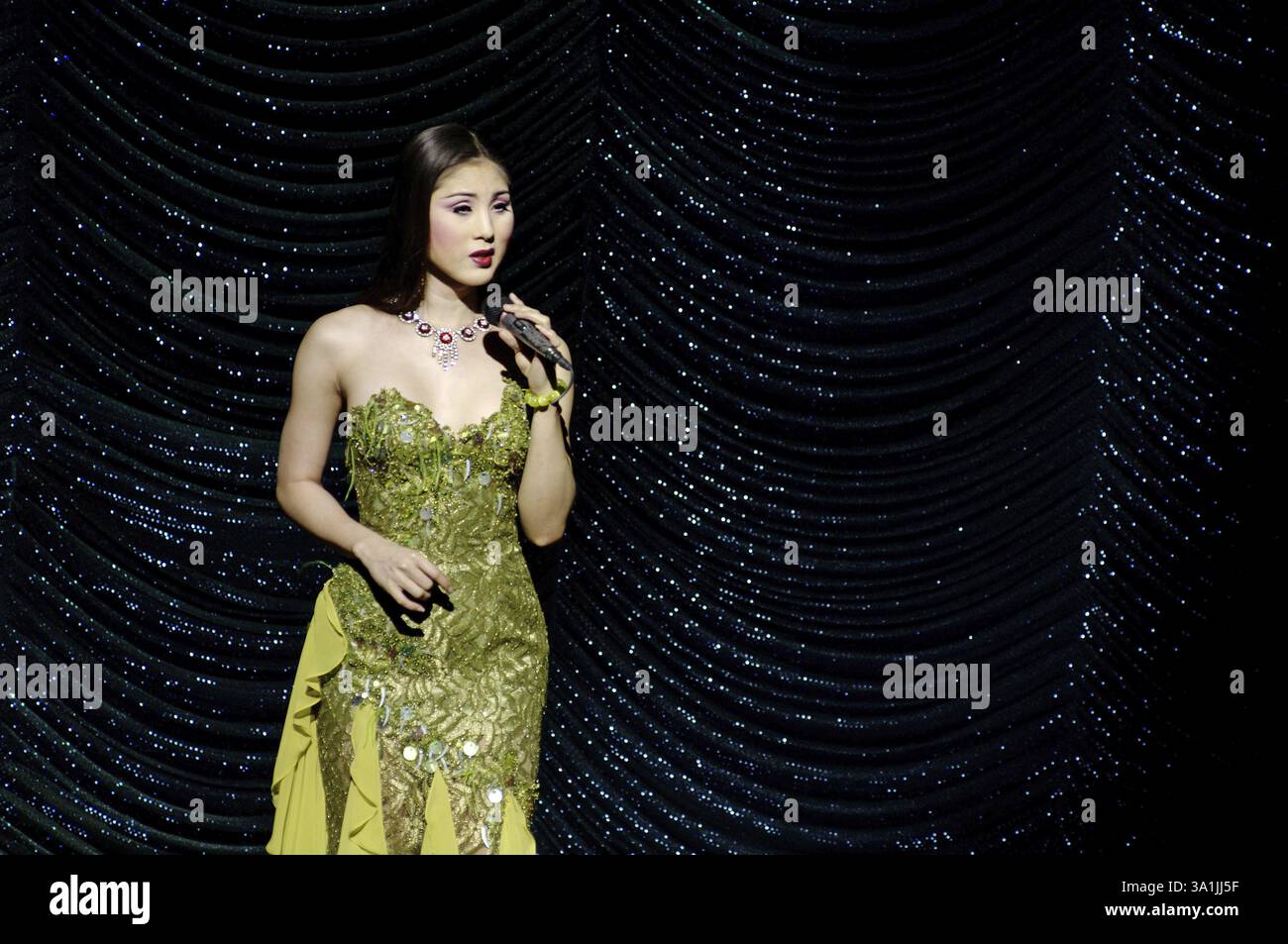 Woman singing song performing stage Alcazar Show Bangkok Thailand South ...