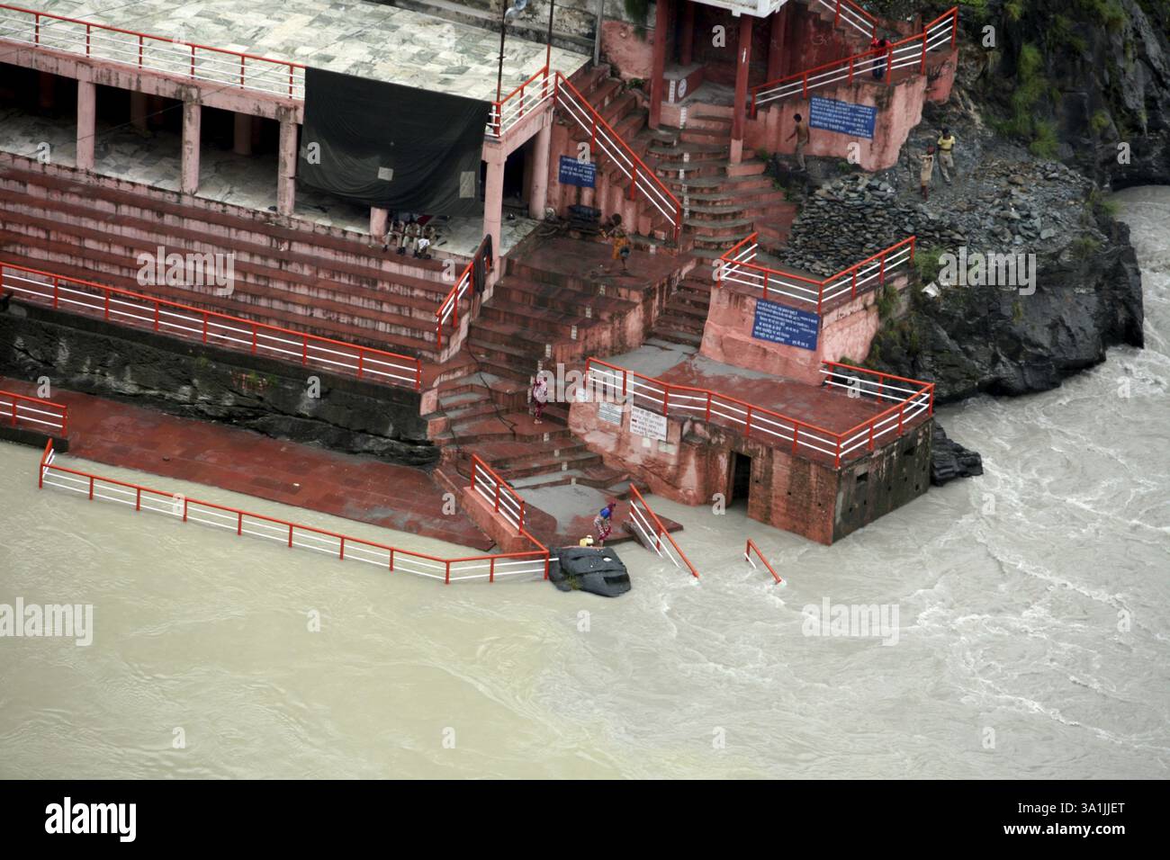 A temple at the confluence of the Alaknanda, the Bhagirathi where they ...