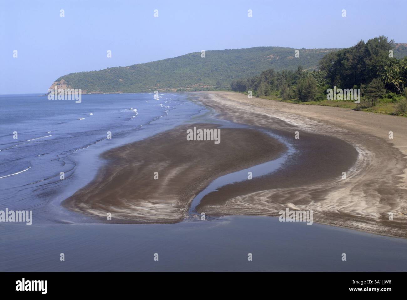 Beautiful Harihareshwar Beach with sand, greenery and mountain, Arabian ...
