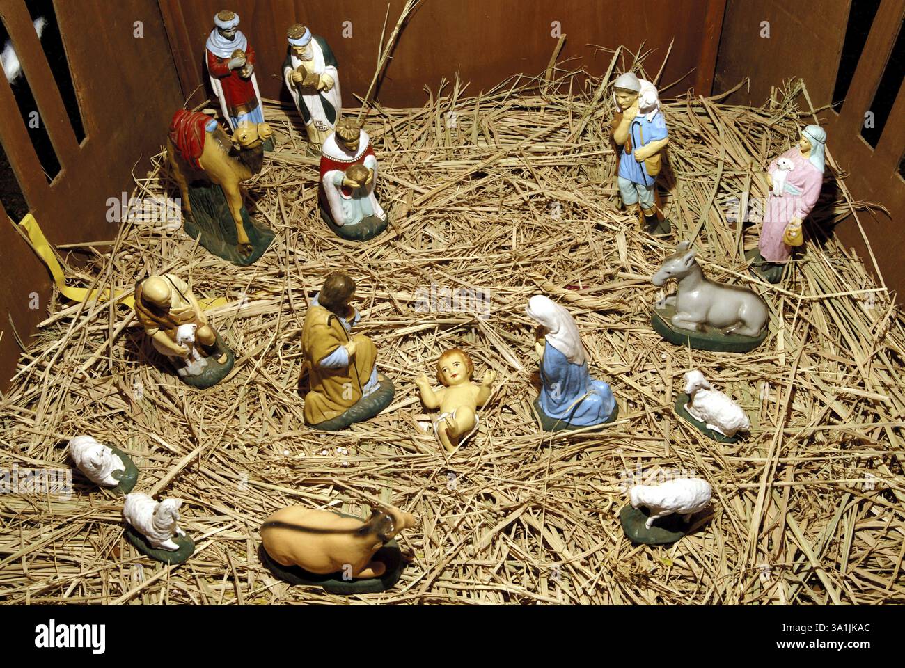 Tableaux of nativity scenes showing baby Jesus in a crib with Mary and ...