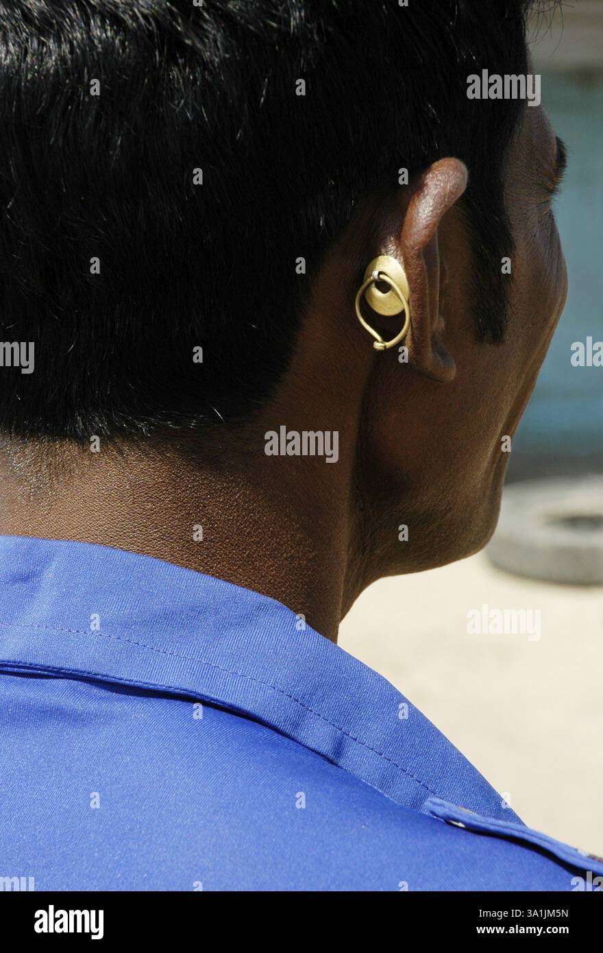 Mens ear ring hi-res stock photography and images - Alamy