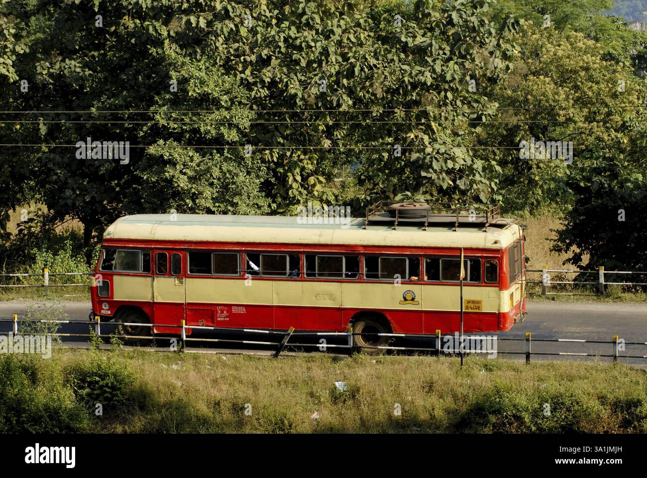 Fast moving state transport bus, traffic on national highway number 17 ...