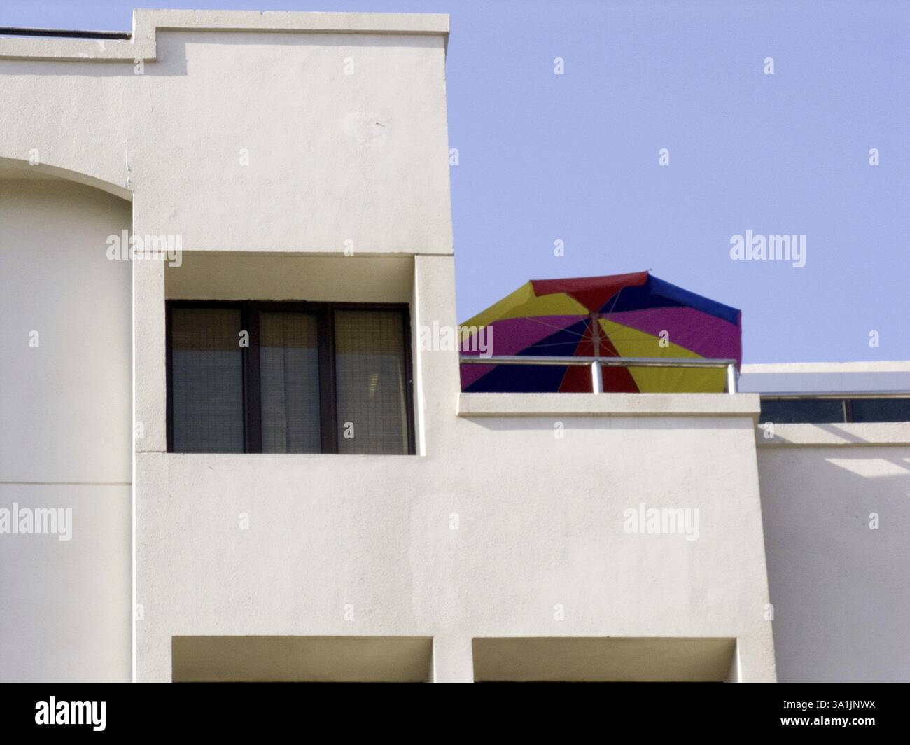 Umbrella on roof of modern building, Hyderabad, Andhra Pradesh, India ...