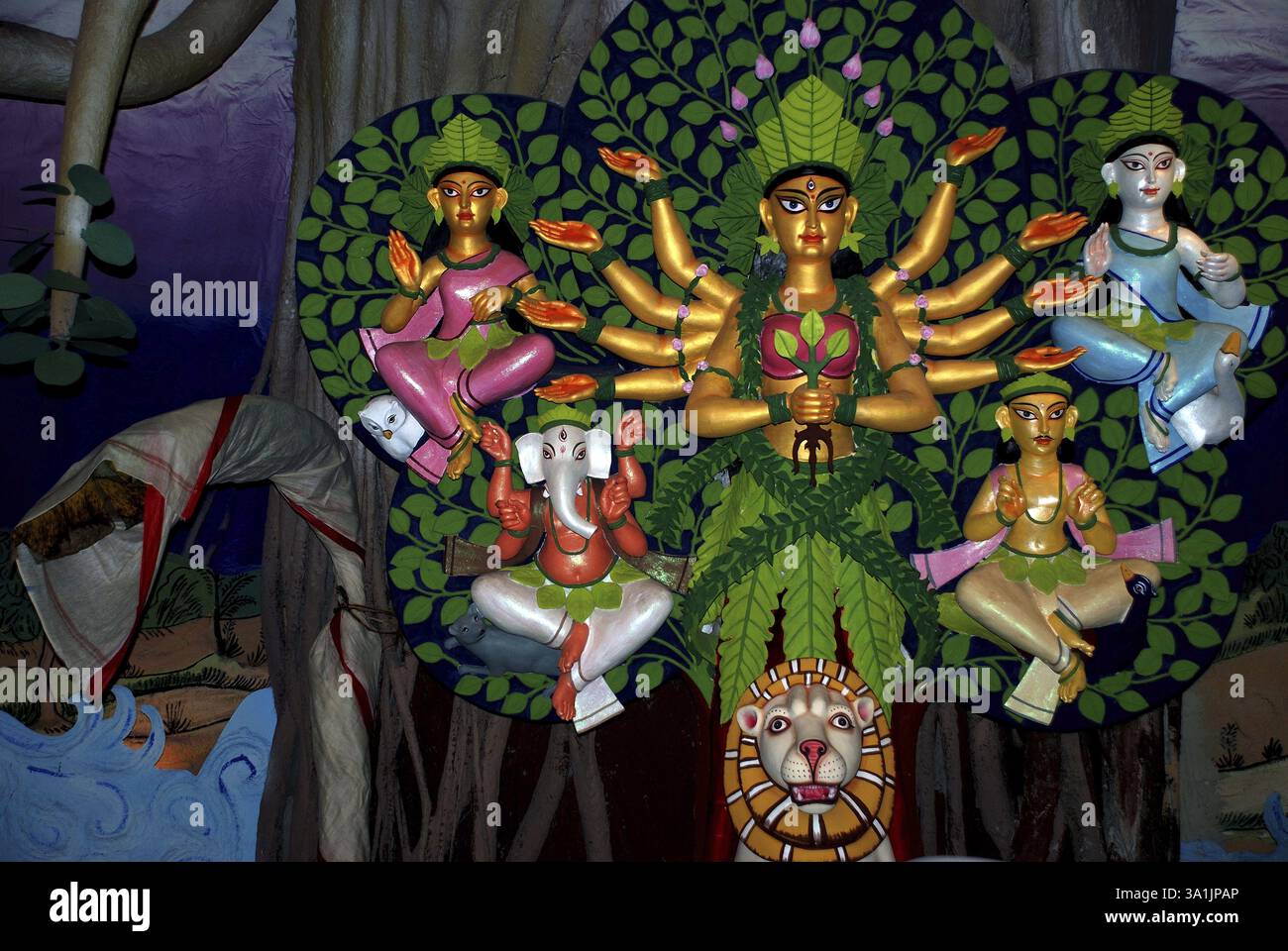 Durga clay model with statues of kartikeya ganesha and lakshmi ...