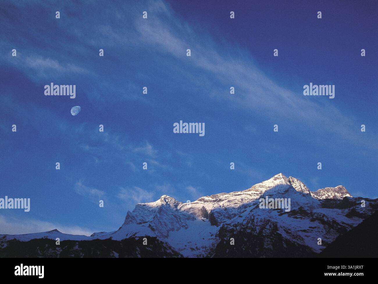 SNAw on peaks Stock Photo - Alamy