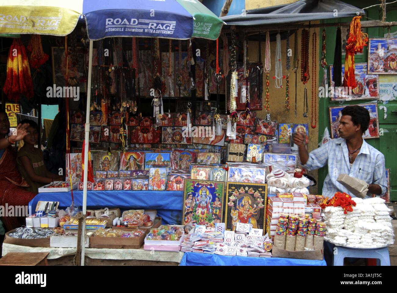 Shopkeeper selling still life thing, Calcutta, India, Asia Stock Photo ...