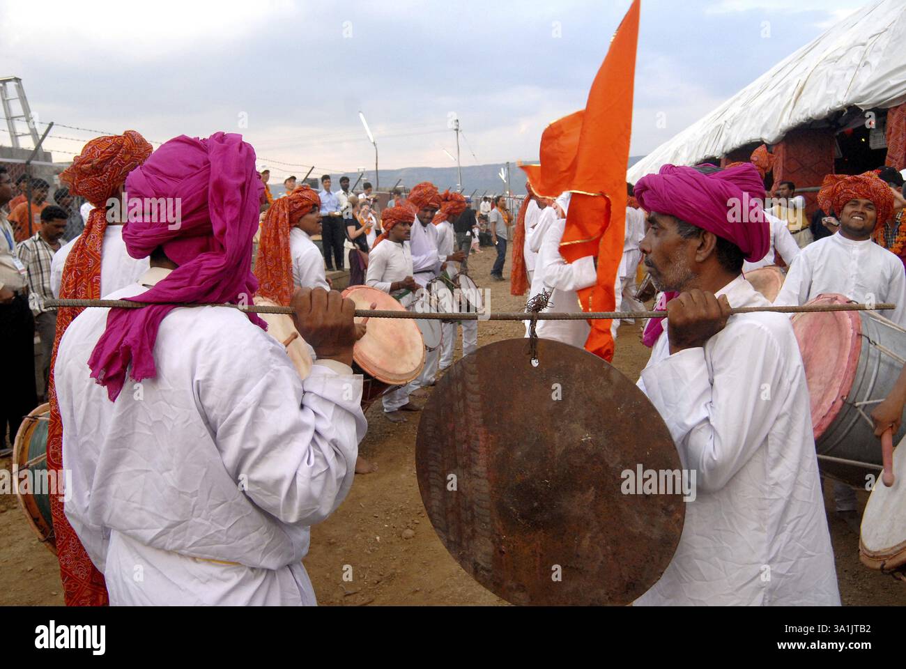 Dancers perform the traditional Marathi folk dance to welcome former ...