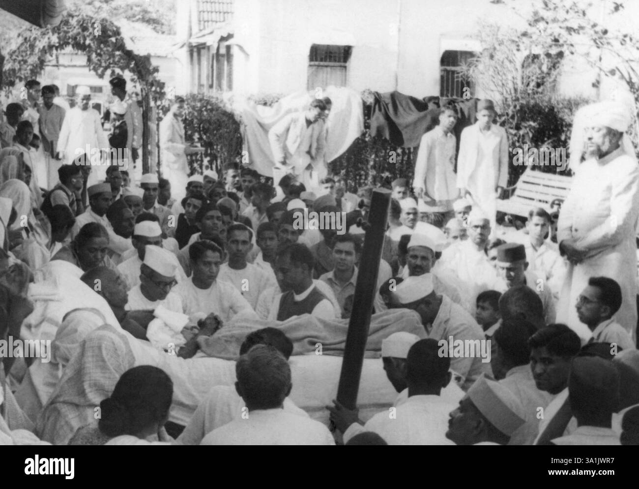 Ashramite Bhansali during his 60 days fast with people standing around ...