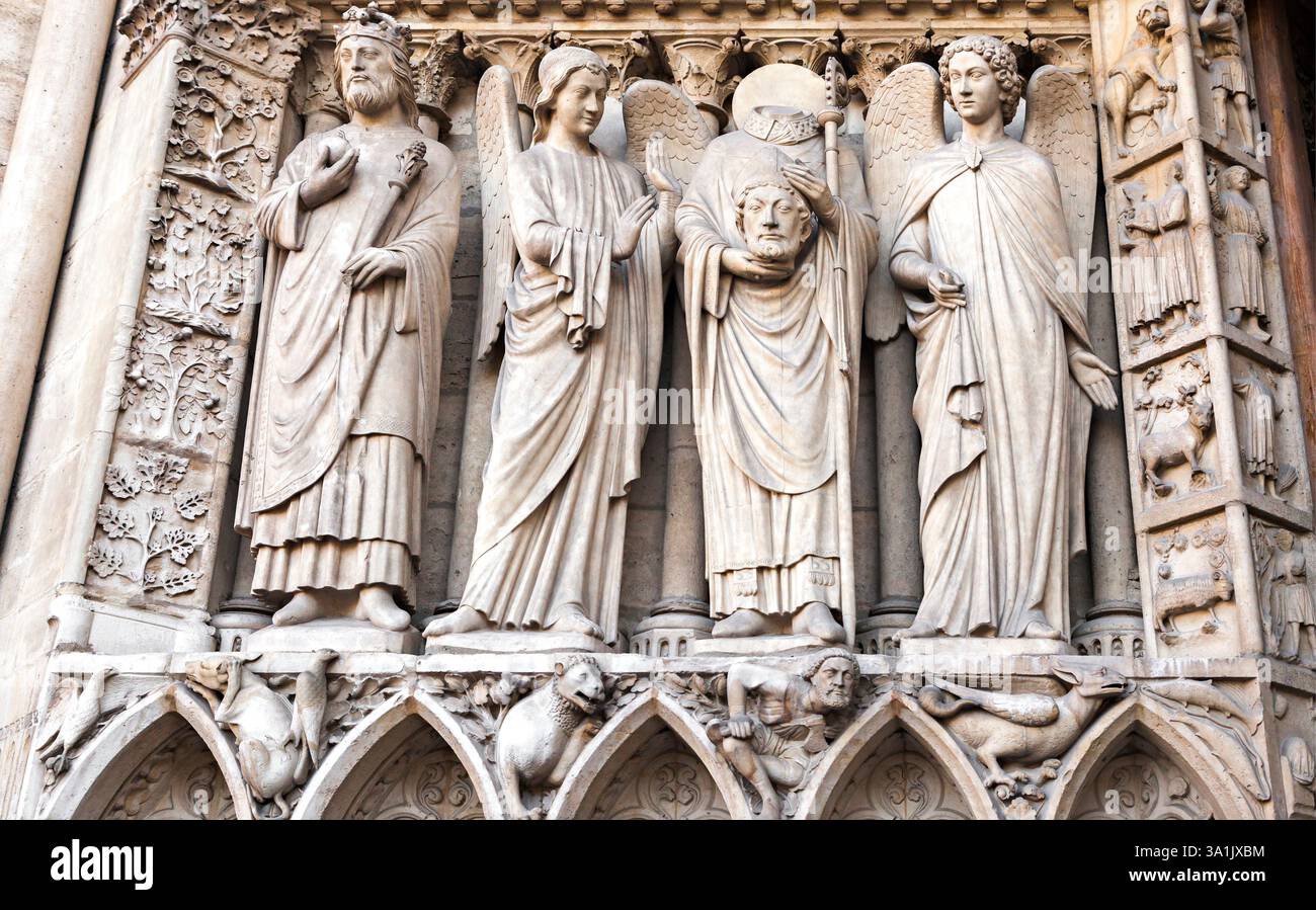 Stone sculptures represent biblical characters, featuring detailed ...