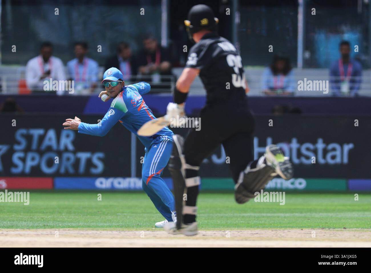 India's Shubman Gill fields the ball after a shot played by New Zealand ...