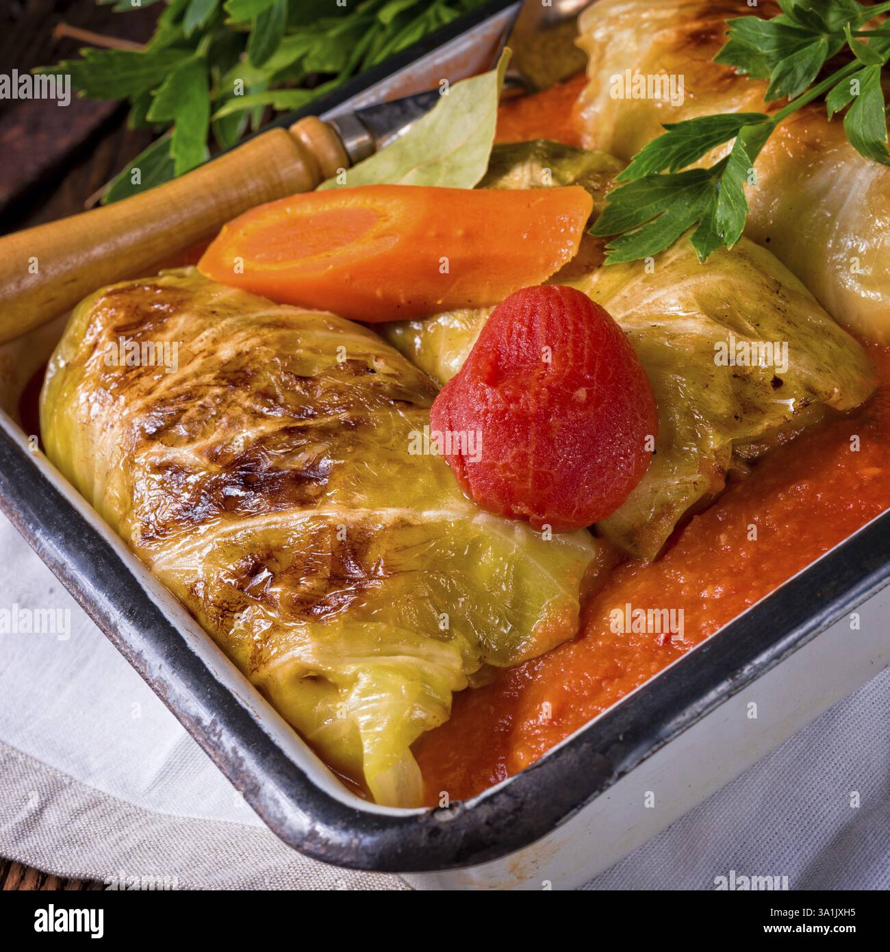 Golabki - polish cabbage rolls in tomato sauce Stock Photo - Alamy