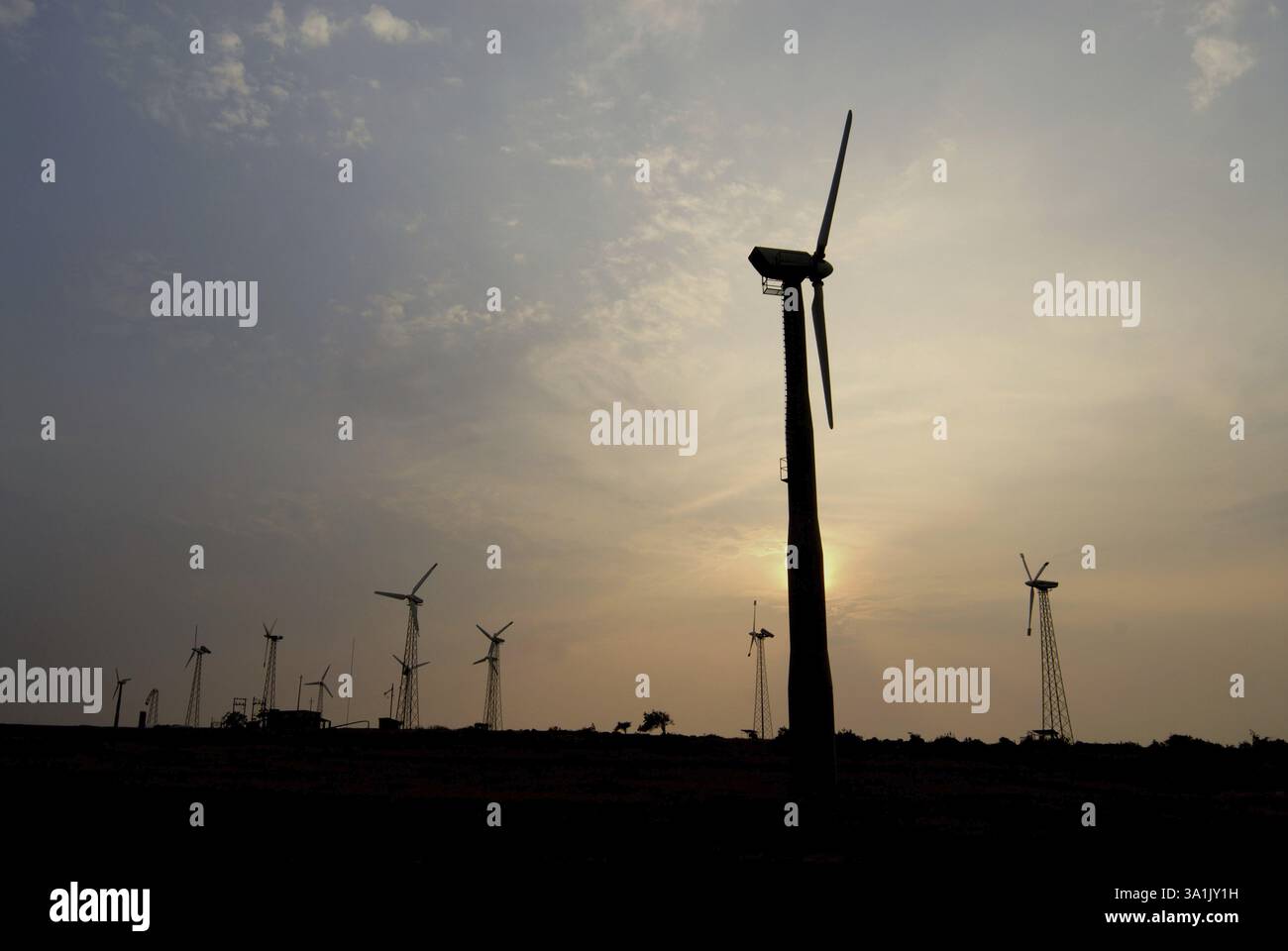 Windmills, Silhouette at colorful cloudy sunset, Devgad, District ...