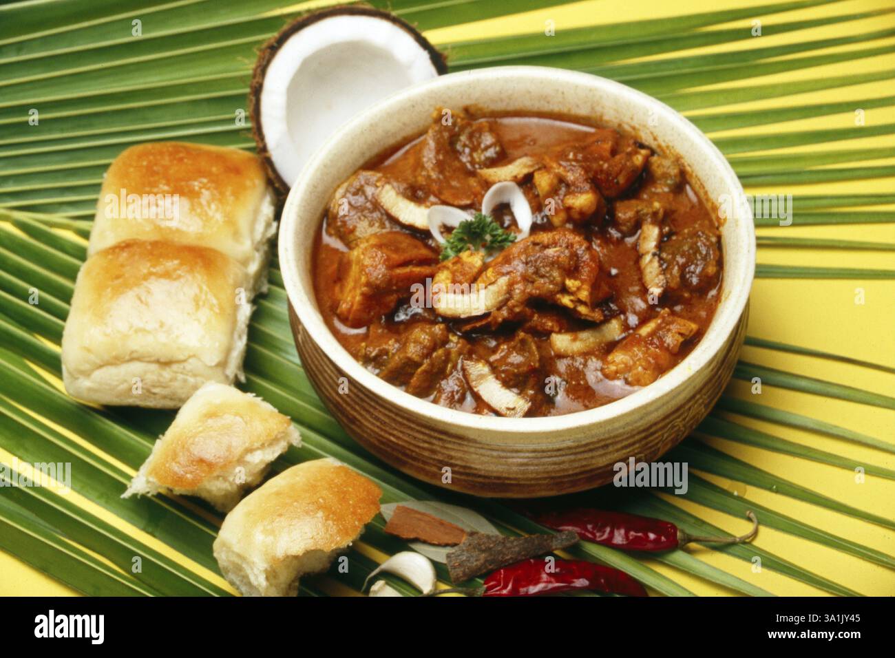 NAn vegetarian dish, Goan dish, mutton vindaloo with bread Stock Photo ...